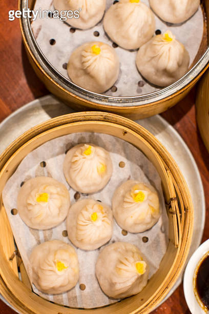 Shanghai style Steamed crab meat dumpings (Xiao Long Bao) on the table ...