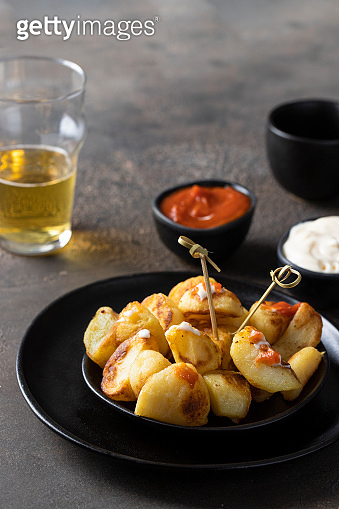 Patatas bravas o brave potatoes image. Famous Spanish tapa, fried ...