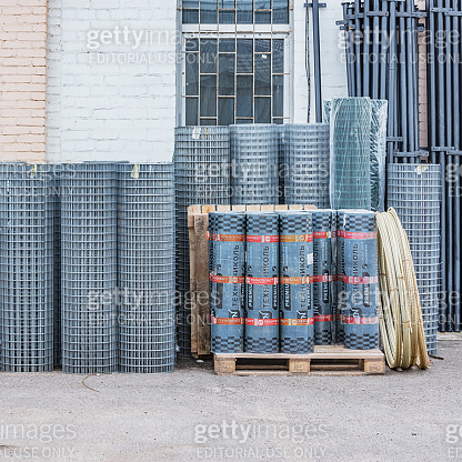 Barbed wire and metal grid by rhe construction market shop. (1404860535 ...