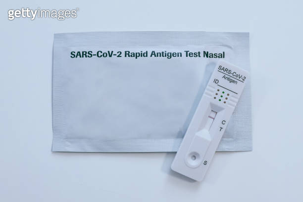 Closeup view of SARS-CoV-2 rapid antigen test nasal. Self test verifies ...