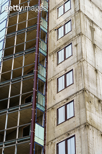 construction of a modern high-rise building, concrete walls and metal ...