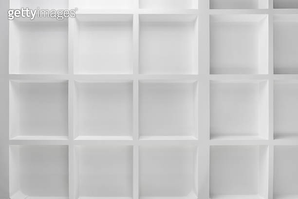 Spatial background: concrete architectural detail with square forms ...