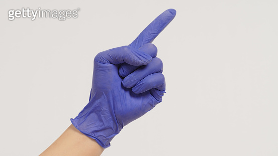 Close up of Hand is doing point finger hand sign on white background ...