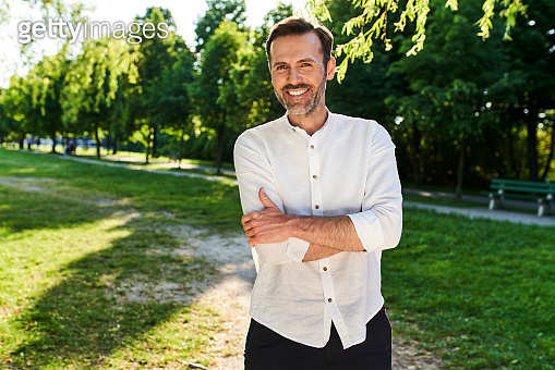 Smiling man standing at park during summer afternoon 이미지 (1413954893 ...