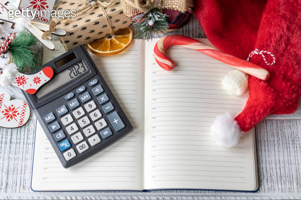 New Year's layout with calculator, Santa's hat and Christmas ...