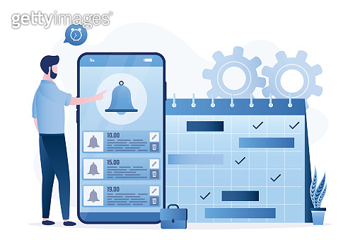 Businessman sets up notifications and an alarm clock on his smartphone ...