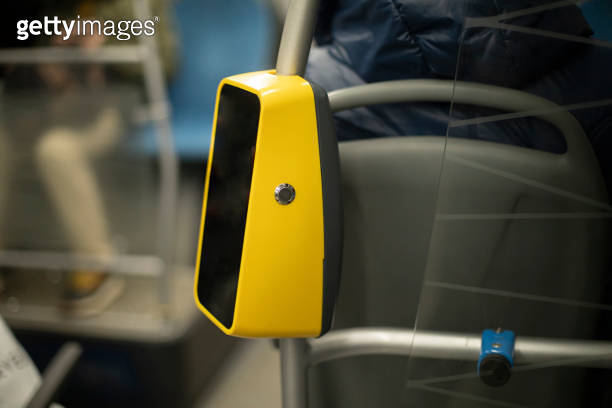 Fare payment device. Yellow reader. NFS label for bank card ...