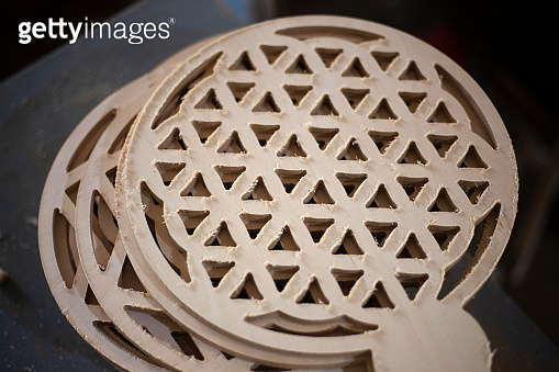 Fractal carved from wood. Workpiece made of plywood on CNC machine ...
