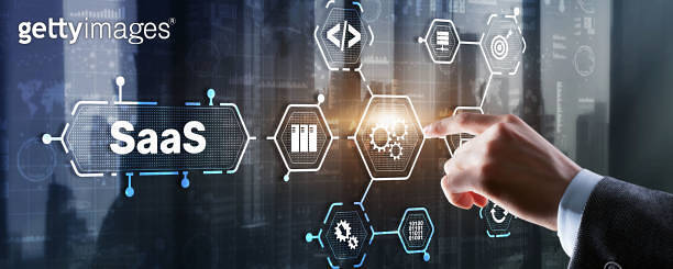 SaaS Software as a Service concept with man hand pressing text 이미지 (1414668647) - 게티이미지뱅크