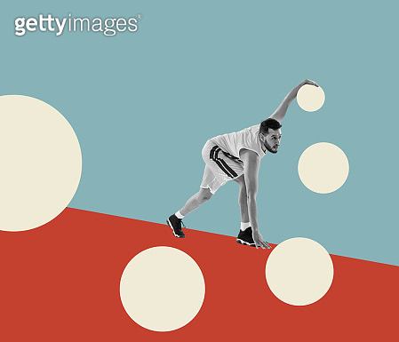 Professional basketball player with ball over abstract background ...