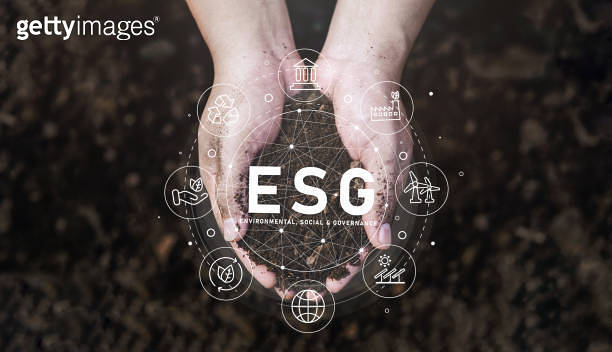 ESG icon concept in farmer's expert hands checking soil health for ...