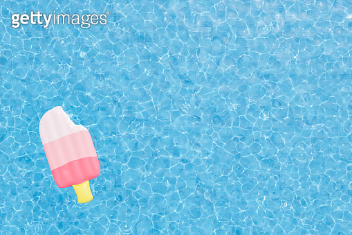 3D rendered inflatable popsicle floating in swimming pool (1396891269 ...