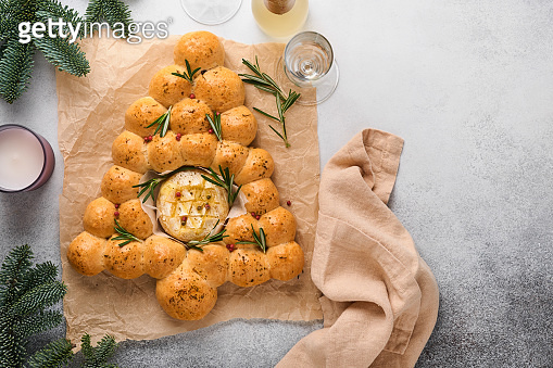 Bread buns Christmas tree with Roasted camembert cheese and rosemary on ...