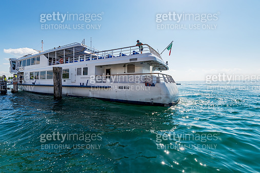 Ferry Boat Terminal of the small village of Bardolino - Lake Garda ...
