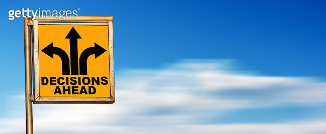 Decisions Ahead Road Sign against a Blurred Clear Sky with Clouds ...