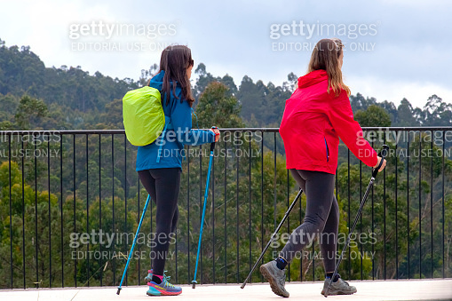 'Camino de Santiago', Galicia, Spain, side view of two female pilgrims ...