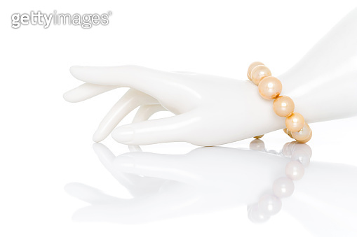 Freshwater pearl bracelet on plastic mannequin female hand. Collection ...