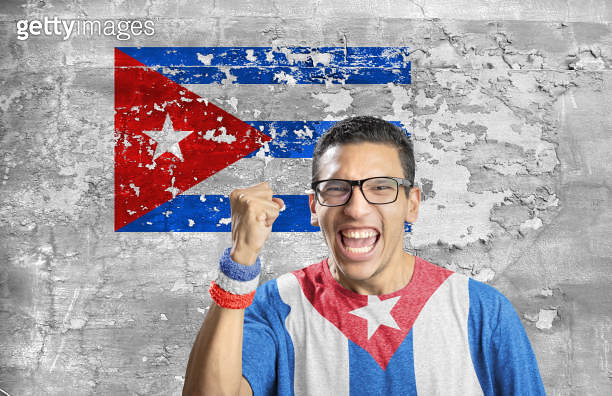 Fan national team of Cuba celebrating with raised fist 이미지 (1393384177 ...