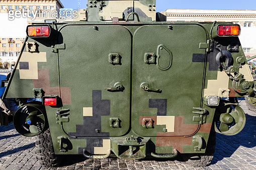 Enlarged fragment of the texture of a tracked armored military vehicle ...