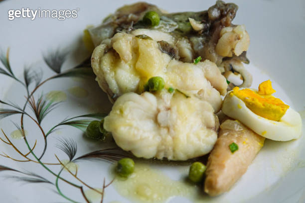 monkfish, fish in green sauce with asparagus, hard-boiled egg and peas ...