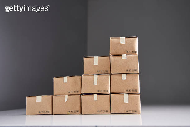 stack of cardboard boxes as a business graph 이미지 (1366989450) - 게티이미지뱅크