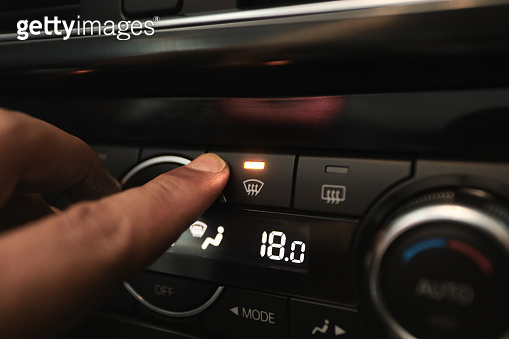 Windshield Defogger Icon on Car. hand pressing the defogger button to ...