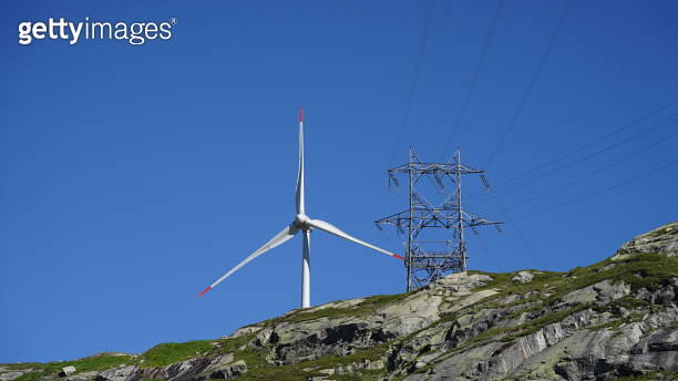 San Gottardo Mountain Pass, Switzerland. A wind turbine working at high ...