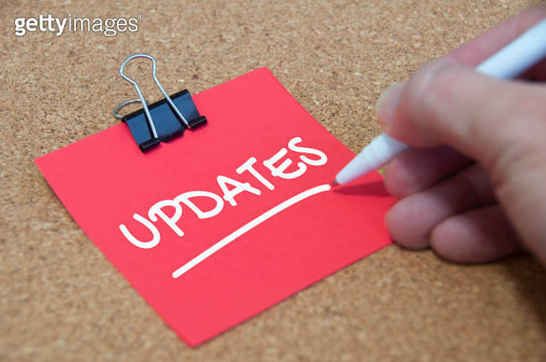 Update text on red notepad with wooden cover background. Update concept ...