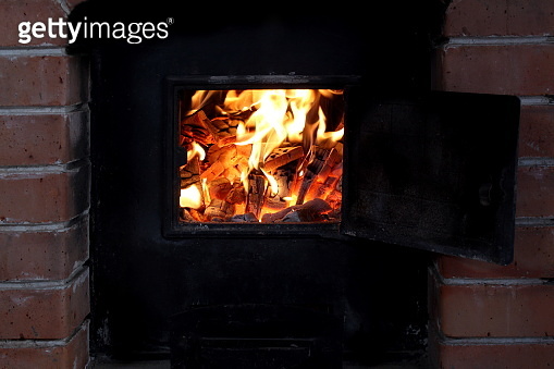 A strong fire burns in an iron furnace. 이미지 (1403626133) - 게티이미지뱅크