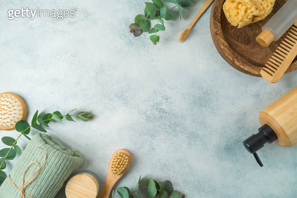 Body care and bathroom accessories on gray concrete background ...