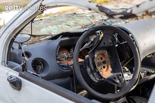 Close-up of the steering wheel of a car after the accident. No driver ...