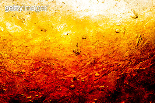 macro soft drink texture,Close up view of the ice cubes in dark cola background. Texture of ...