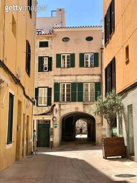 Spain - Minorca- Port Mahon- little street and view on the old town of ...