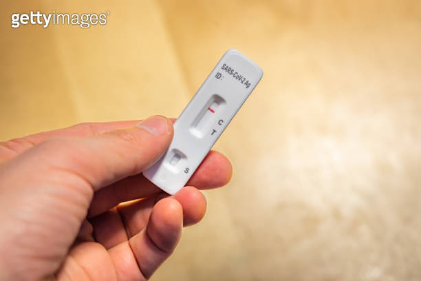 Negative covid-19 auto test with one red line appearing on the test ...