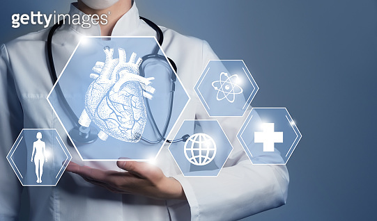 Unrecognizable female doctor holding graphic virtual visualization ...