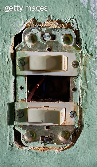old worn out home electrical switches in portrait format 이미지 ...