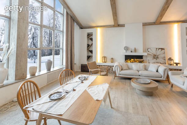 cozy warm home interior of a chic country chalet with a huge panoramic ...
