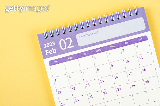 The February 2023 Monthly desk calendar for 2023 year on yellow ...