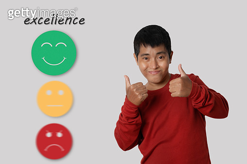 Young man showing approving doing positive gesture with happy Smiley ...