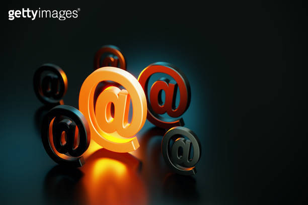 Yellow At Symbol Glowing Amid Black At Symbols On Black Background 이미지 ...