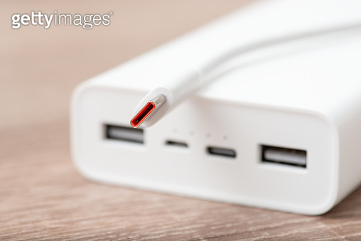 External battery and cable usb Type C close up on the desk 이미지 ...