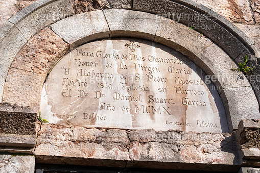 Inscription on the old arched wall of the church San Pedro de los Arcos ...