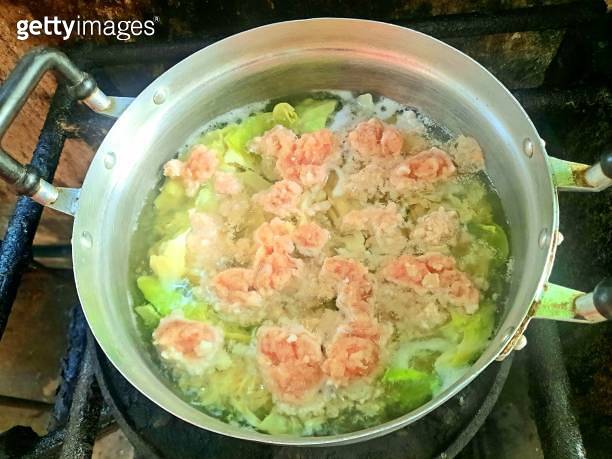 Adding Minced Pork to Cabbage Soup - food preparation. (1382901380 ...