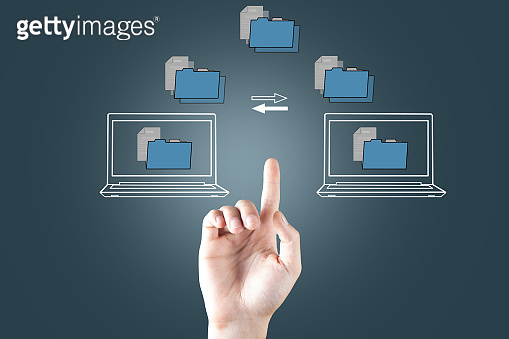 transferring files between laptops on a virtual screen. (1448013876 ...