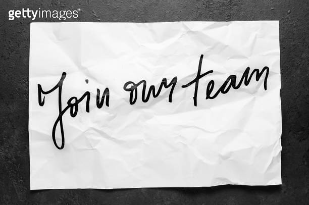 Join our team. Lettering on crumpled white paper. Handwritten text ...