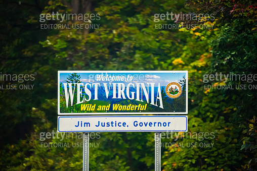 Welcome to West Virginia sign with mountains picture and blue sky by ...