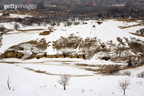 Takht-i Rustam Buddhist monastery complex, completely carved from the ...