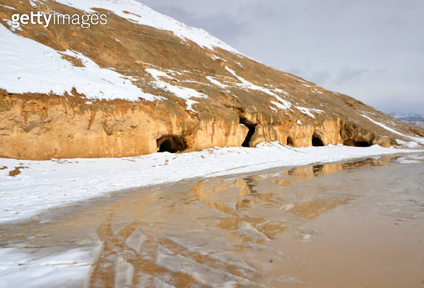 Takht-i Rustam Buddhist caves entrances, Haibak, Samangan Province ...