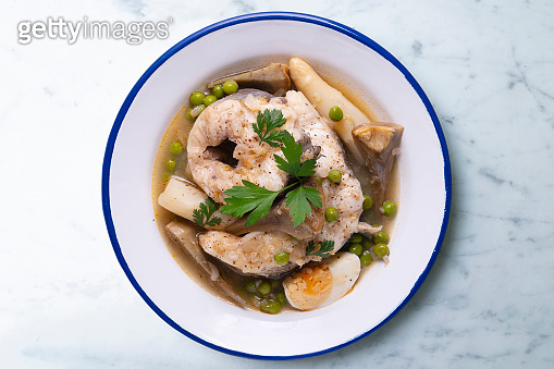 Conger eel with white asparagus and egg. Traditional Spanish tapas from ...