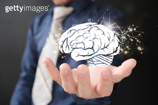 Hands holding a brain with network connections, concept of innovative ...